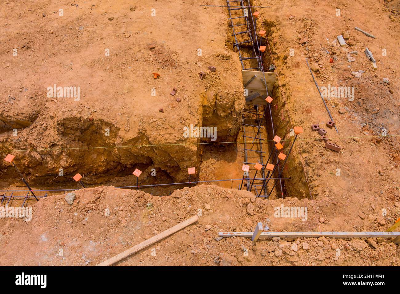 Building cement strip foundation for new house as well creating ...