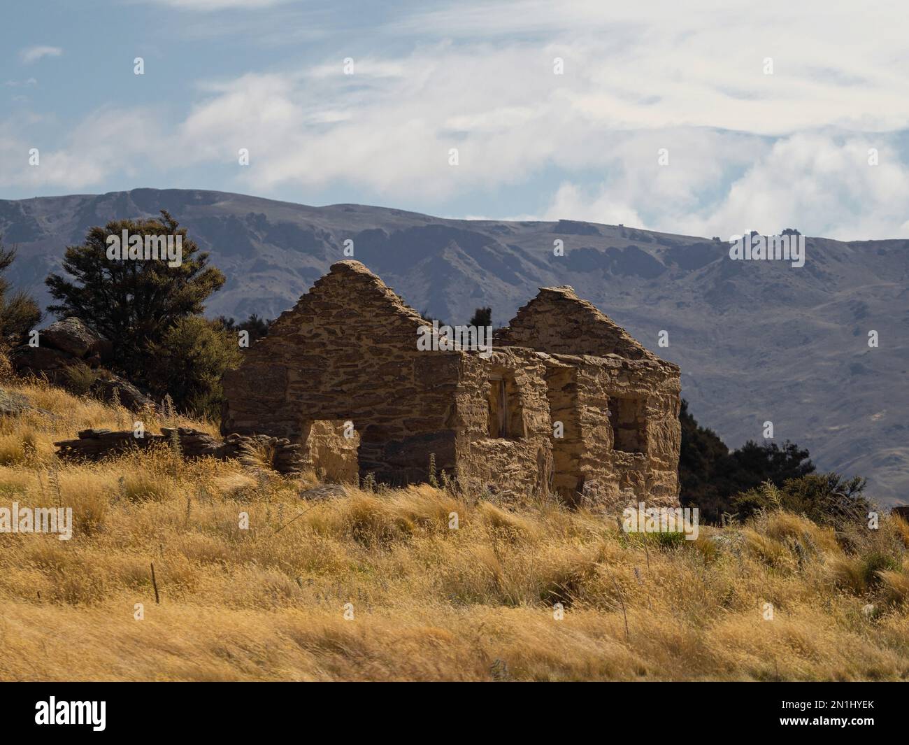 Abandoned run-down house building ruins brick stone walls of goldmining ...
