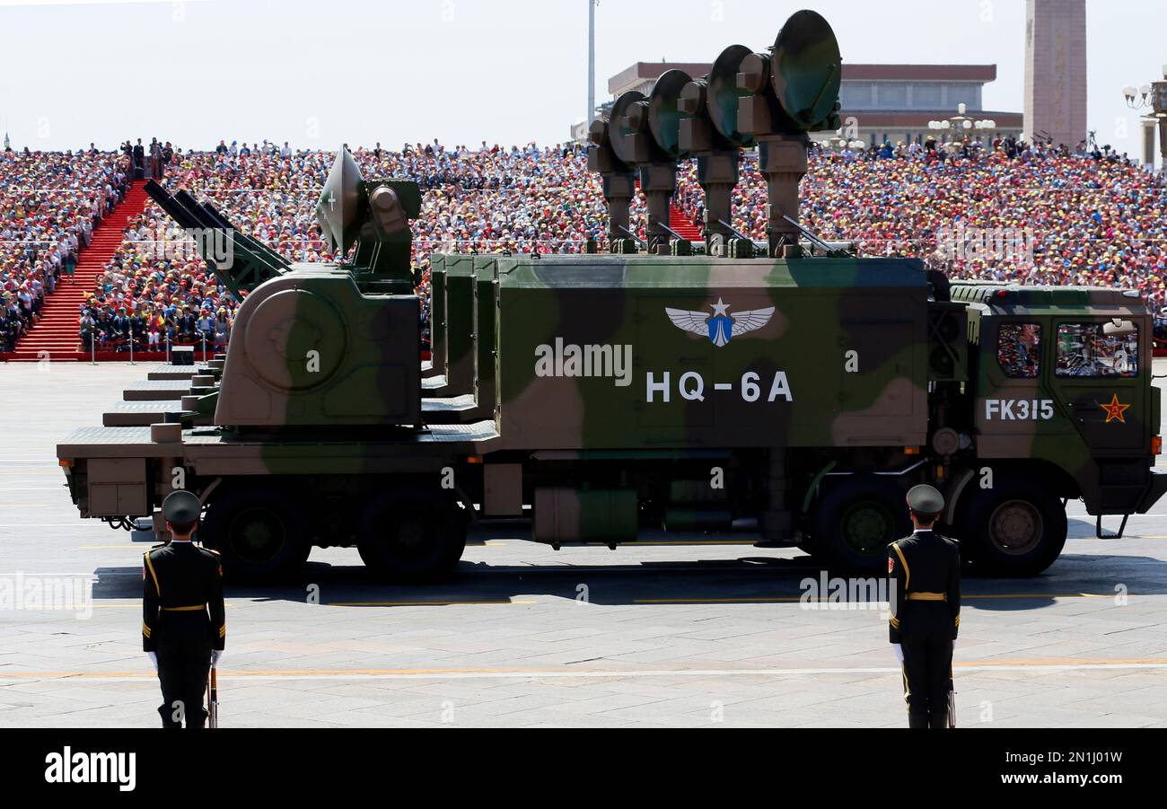 Military vehicles carry radar arrays for HQ-6A surface-to-air missile ...