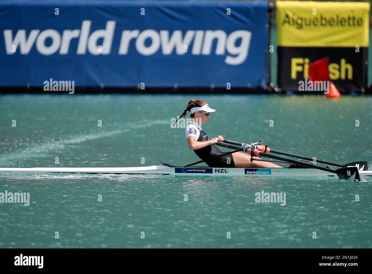 New Zealand's Zoe McBride speeds as she crosses the finish line to win ...