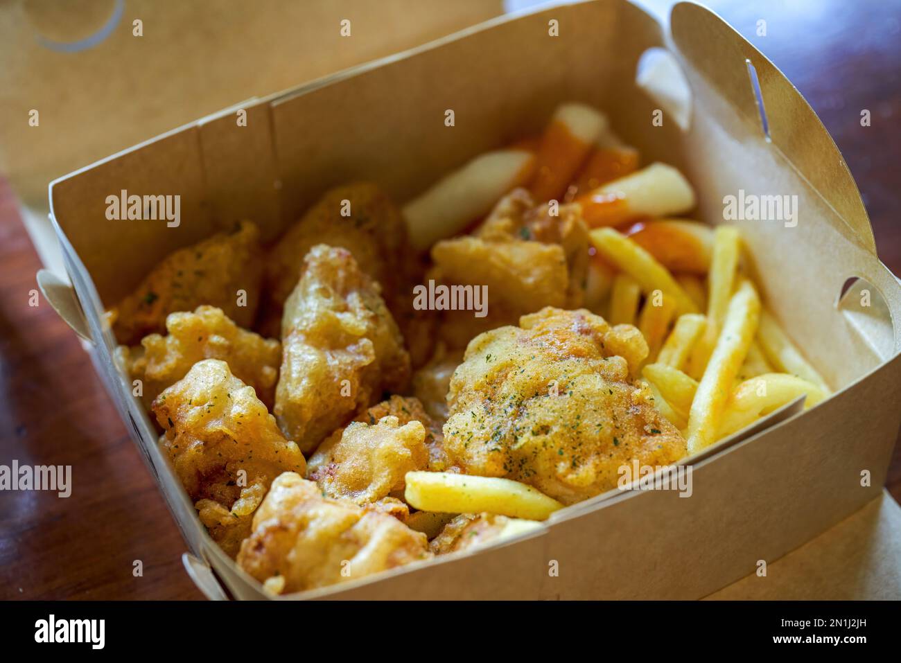 A delicious and crunchy Korean fried chicken served with fried rice ...