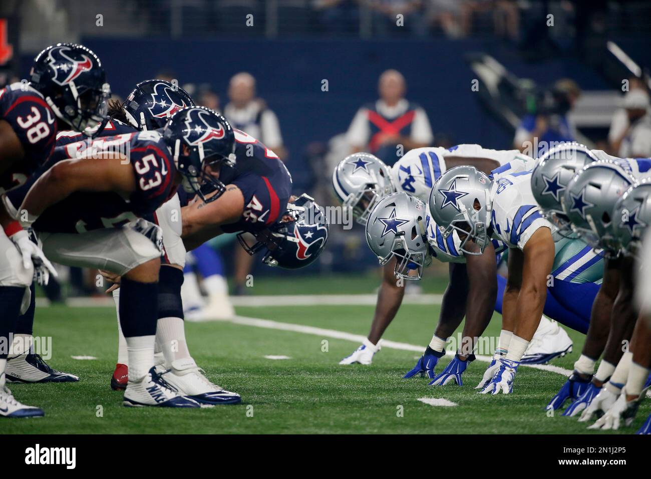 The Houston Texans and Dallas Cowboys line up for a play during the ...