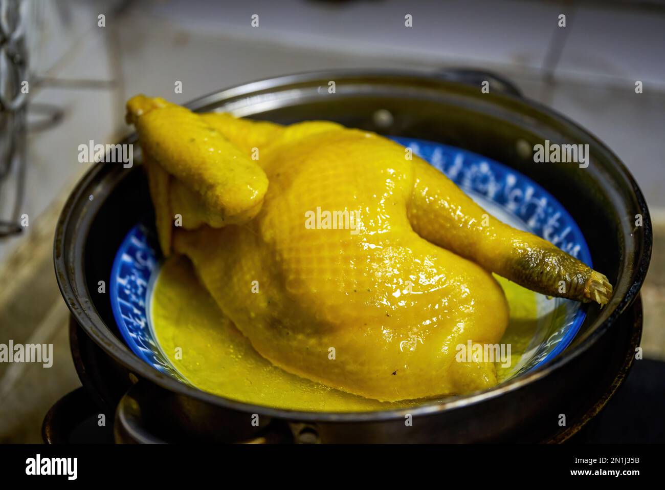 A delicious steamed local chicken in Chinese kitchen Stock Photo - Alamy