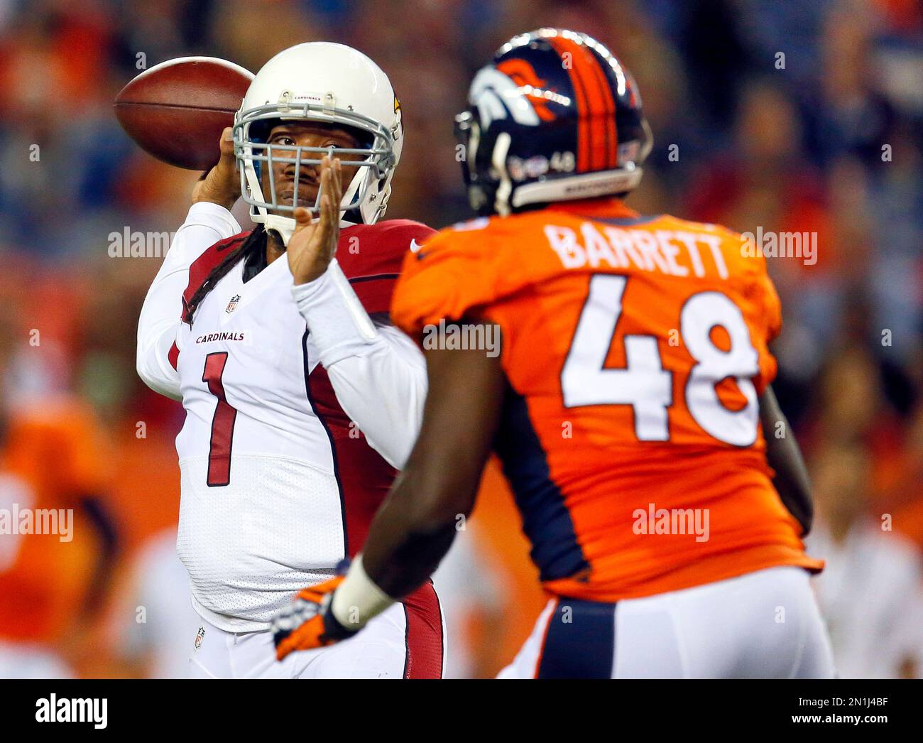 Arizona Cardinals quarterback Phillip Sims (1) throws over Denver ...