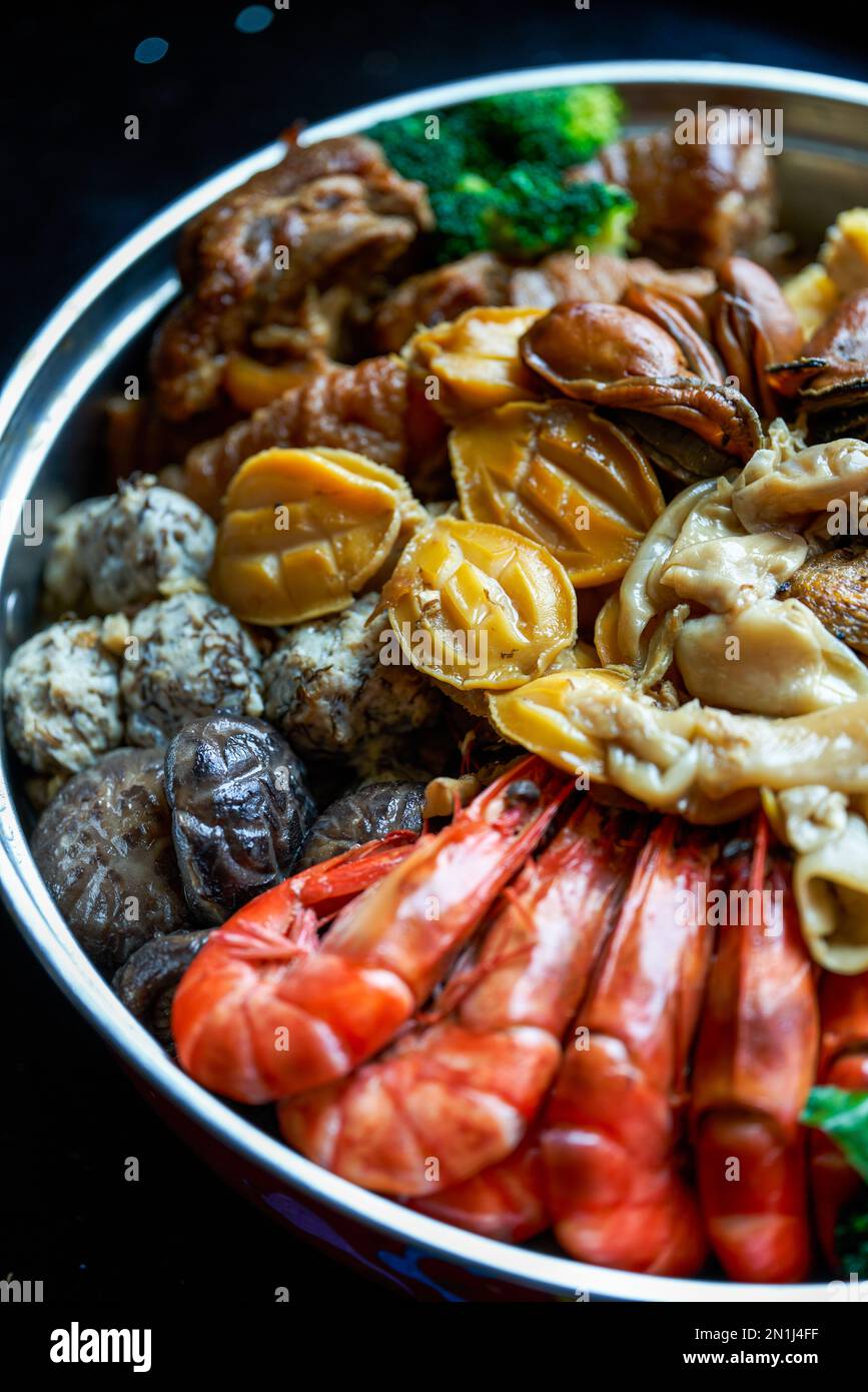 Chinese New Year food during Chinese New Year, assorted big Poon Choi ...