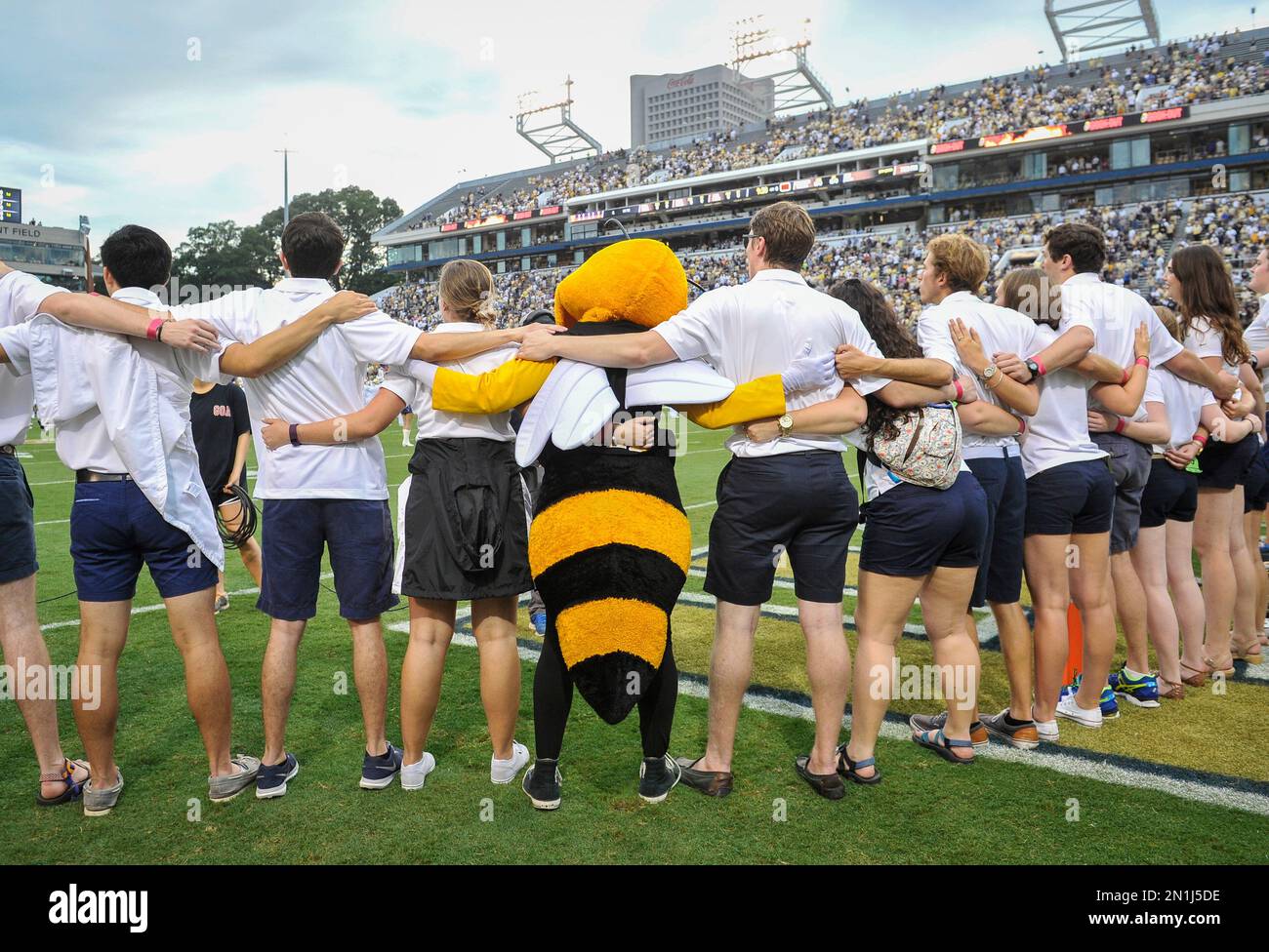 "Buzz" the Georgia Tech mascot joins students in swaying to the alma ...