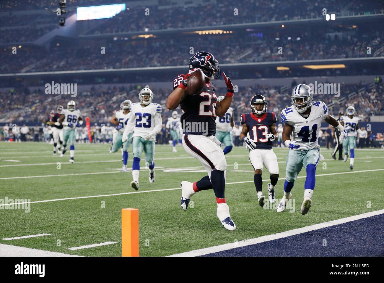 Houston Texans running back Chris Polk (22) scores a touchdown as ...