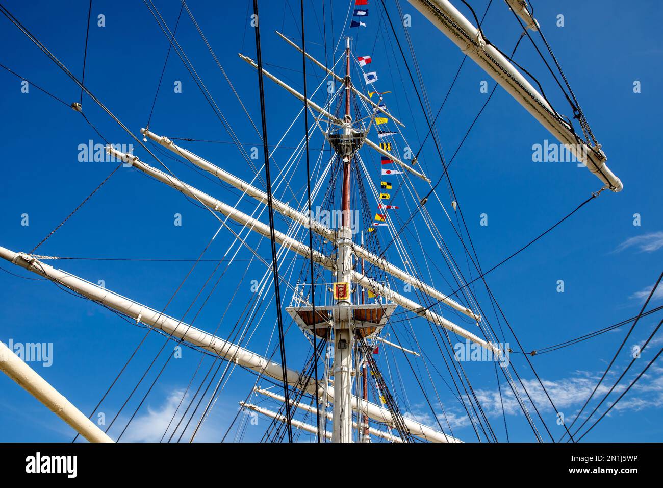 Sailing ship mast with rigging and cables against the sky Stock Photo ...