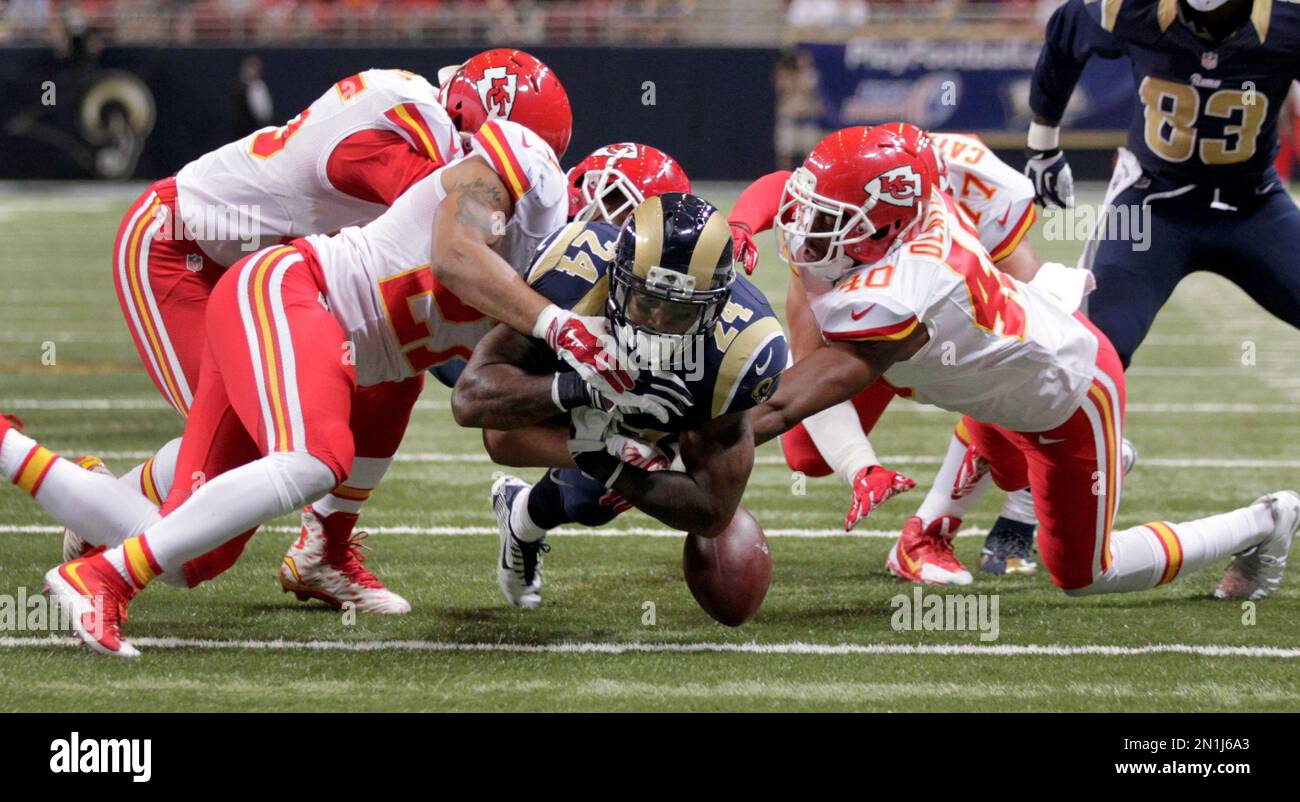 St. Louis Rams running back Isaiah Pead (24) fumbles the ball out of ...