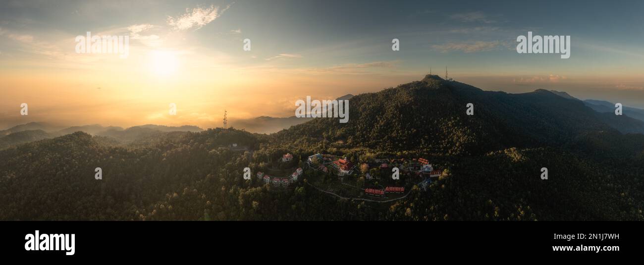 Aerial view of a beautiful sunrise at Jerai Mountain or Gunung Jerai ...