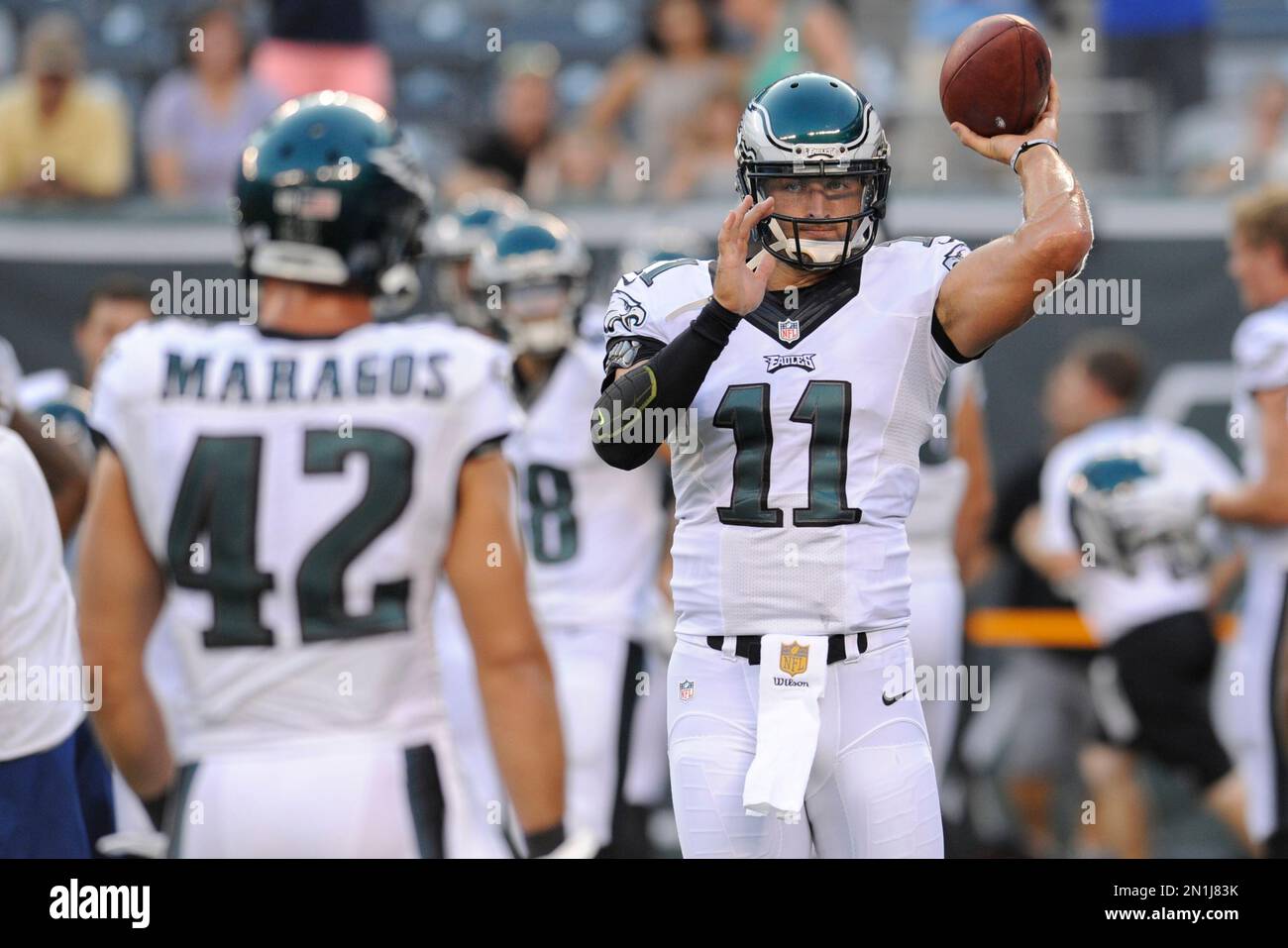 Philadelphia Eagles quarterback Tim Tebow (11) throws a pass to Chris ...