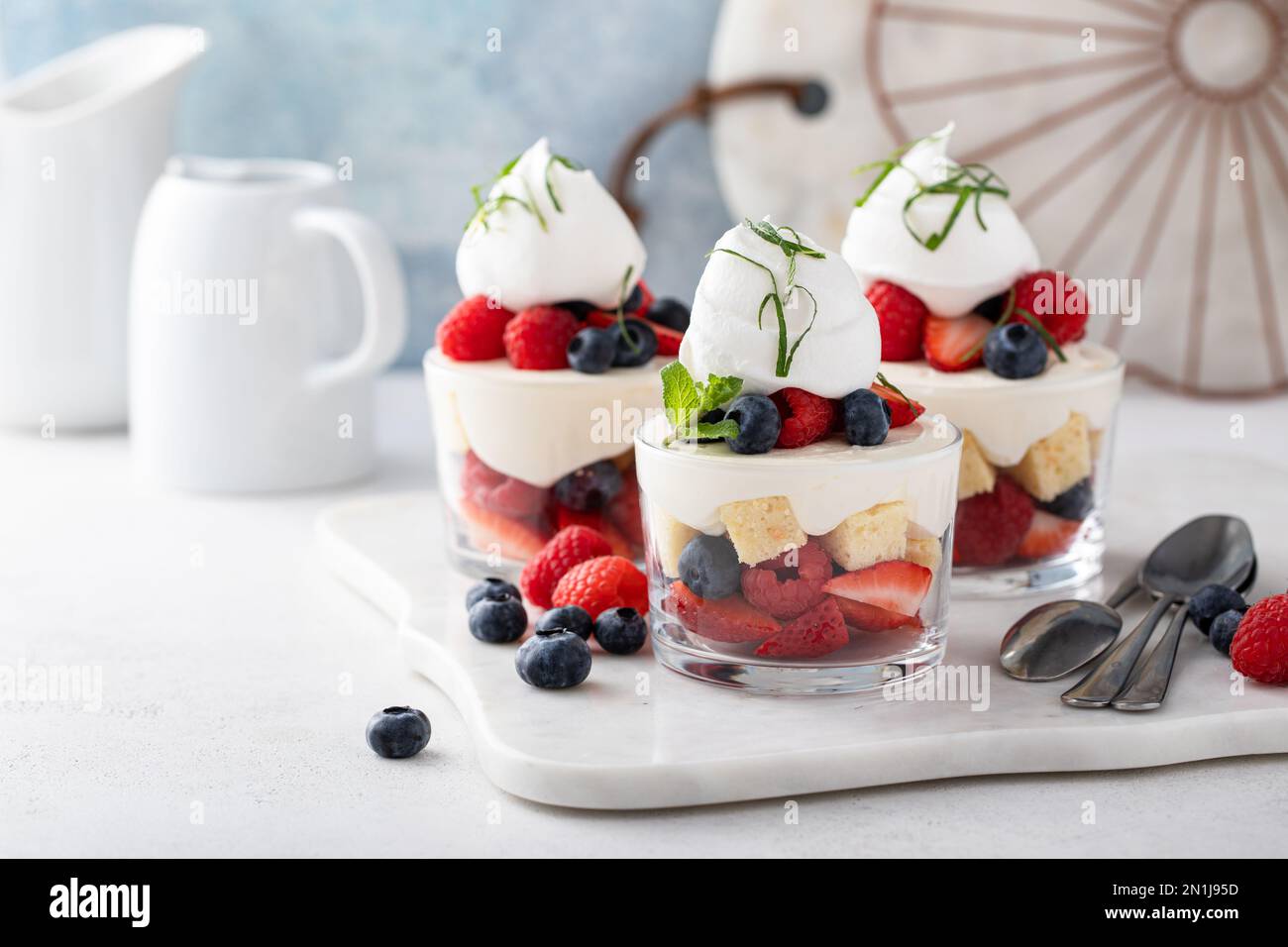 Berry pound cake trifle or parfait with cream cheese mousse and whipped ...