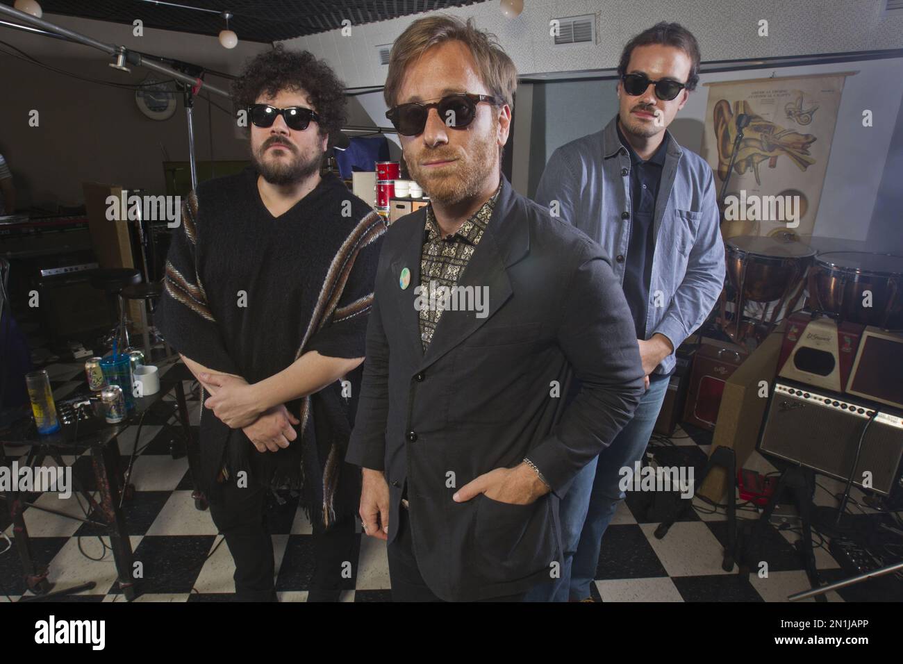 **HOLD FOR STORY** Dan Auerbach, center, Richard Swift, left and Leon ...