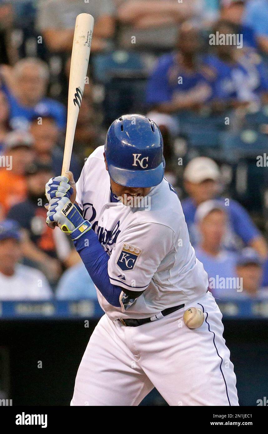 Kansas City Royals' Salvador Perez is hit by a pitch thrown by Detroit ...