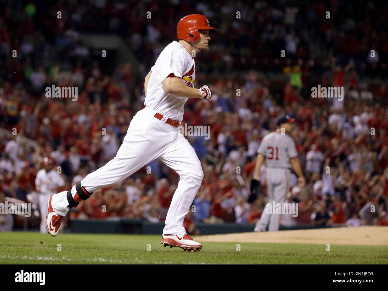 St. Louis Cardinals' Brandon Moss rounds the bases after hitting a solo ...