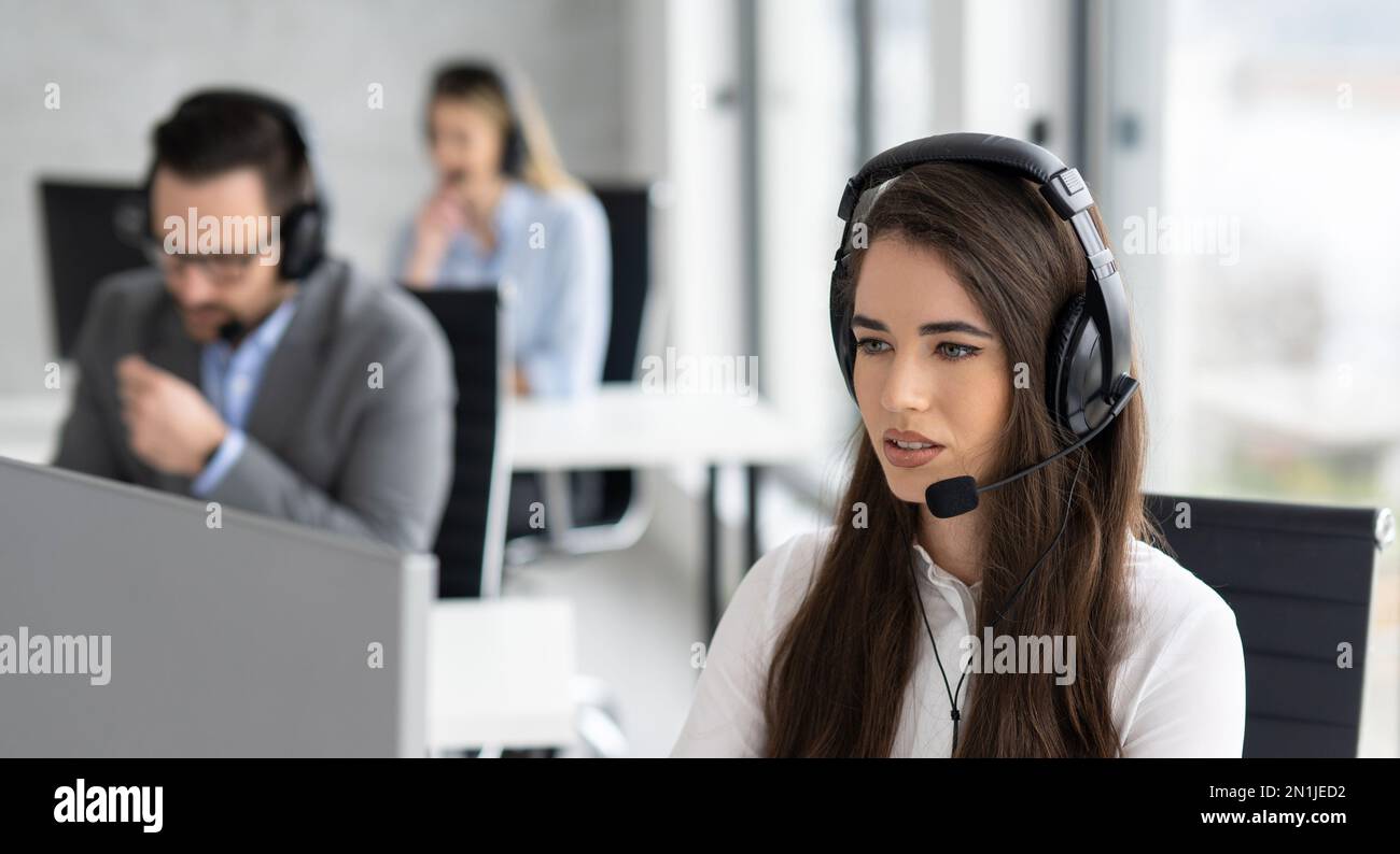 Businessman woman sitting reception desk hi-res stock photography and ...