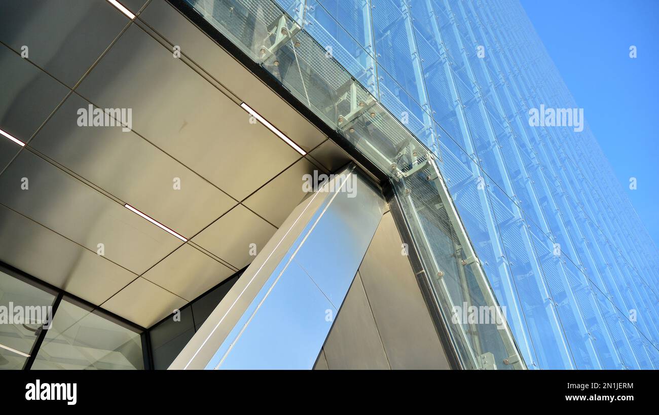 Combination of metal and glass wall material. Steel facade on columns ...