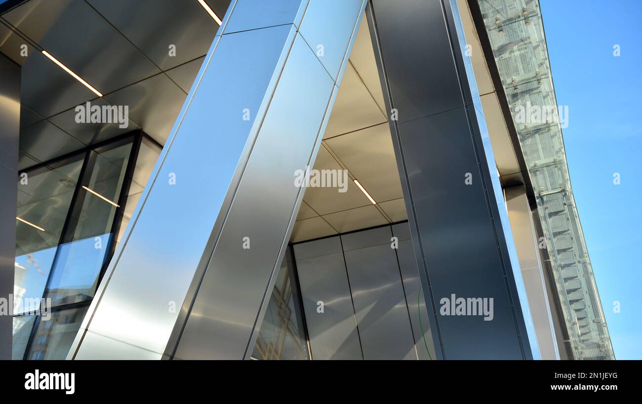 Combination of metal and glass wall material. Steel facade on columns ...