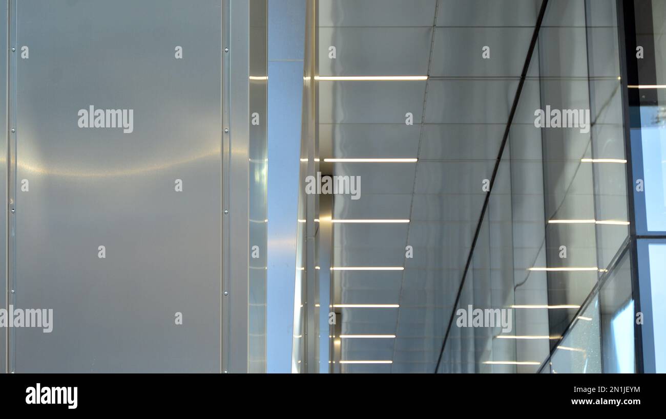 Combination of metal and glass wall material. Steel facade on columns ...