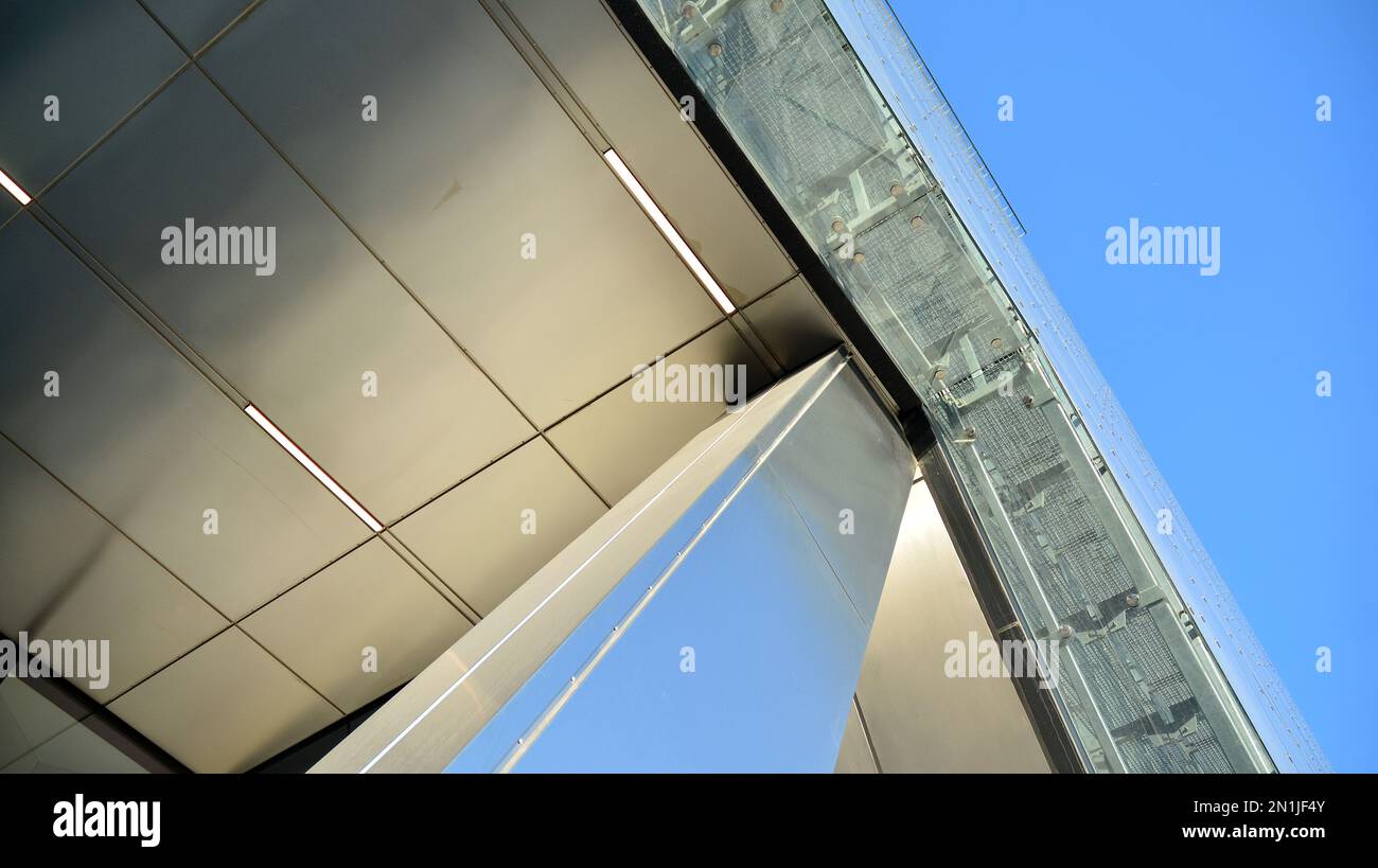 Combination of metal and glass wall material. Steel facade on columns ...