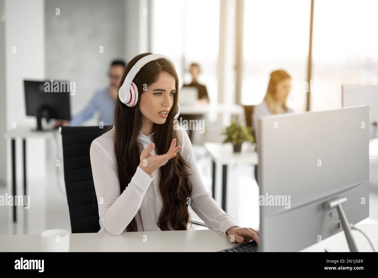 Computer it support worker talking hi-res stock photography and images ...