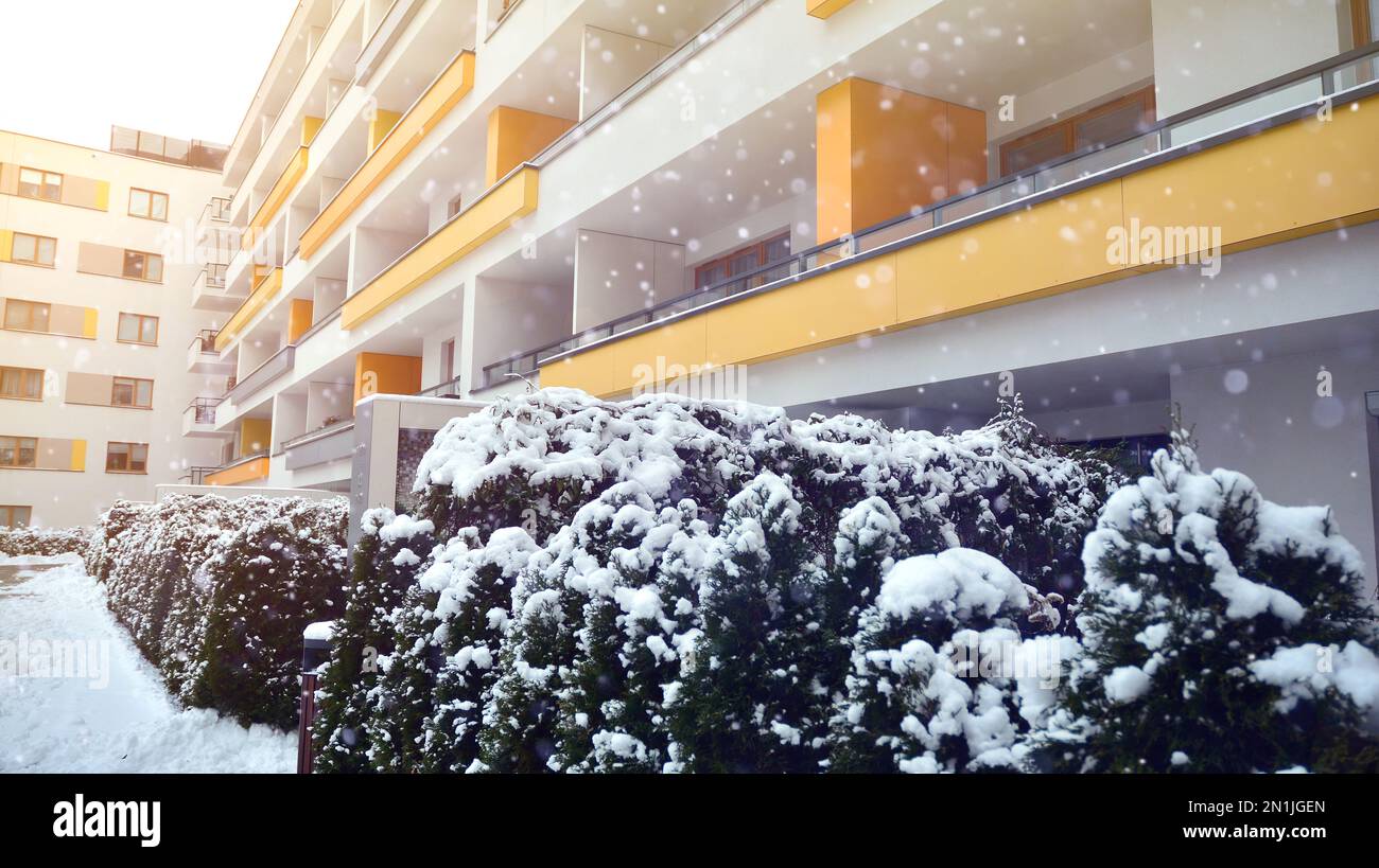 Fragment of modern apartment building on the background of winter ...