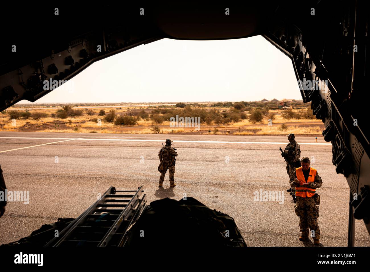 Gao, Mali. 02nd Feb, 2023. Bundeswehr soldiers secure an air force ...