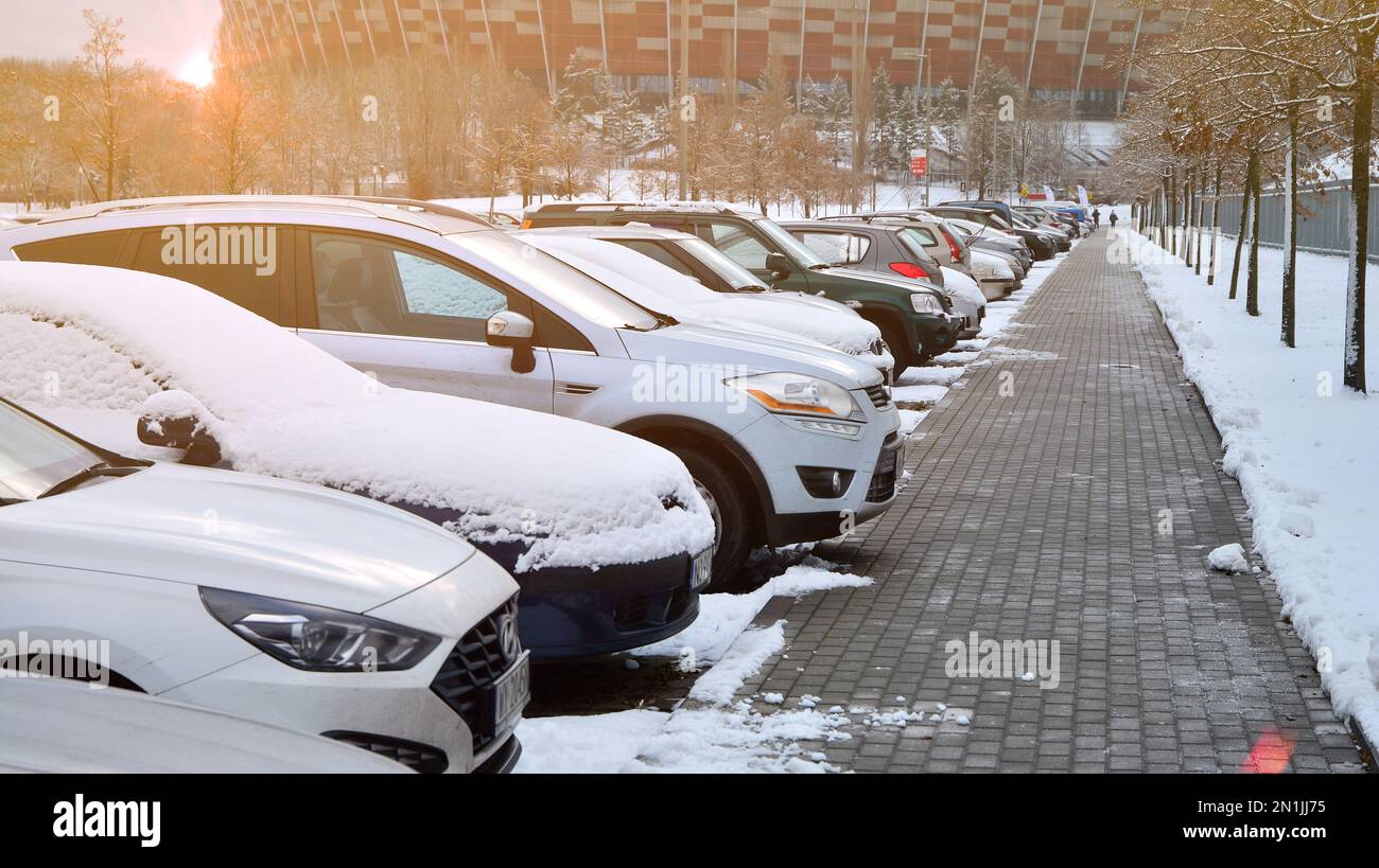 Warsaw, Poland. 13 January 2021. Fresh snow on cars. A thin layer of ...