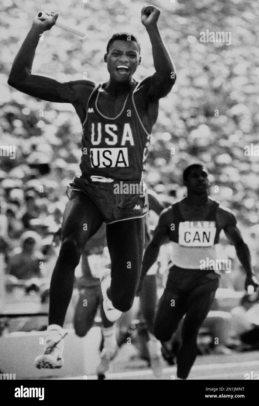 FILE - In this Aug. 11, 1984, file photo, U.S. athlete Carl Lewis lets ...