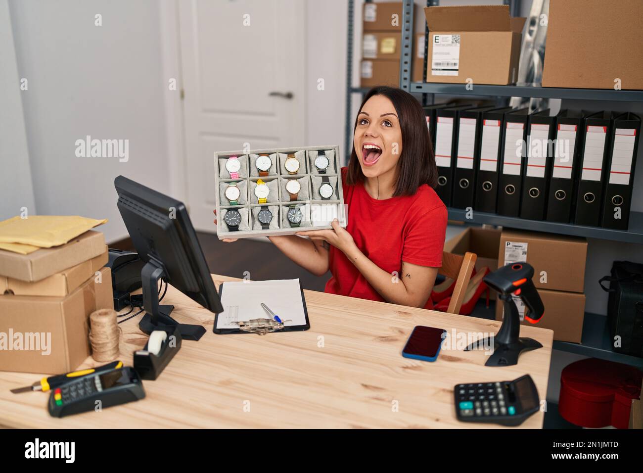 Young hispanic woman working at small business ecommerce selling ...