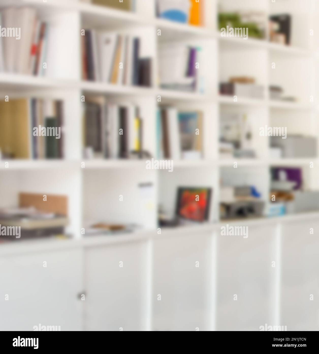 Blurred of bookshelves in the public library. Blurred effect Background ...