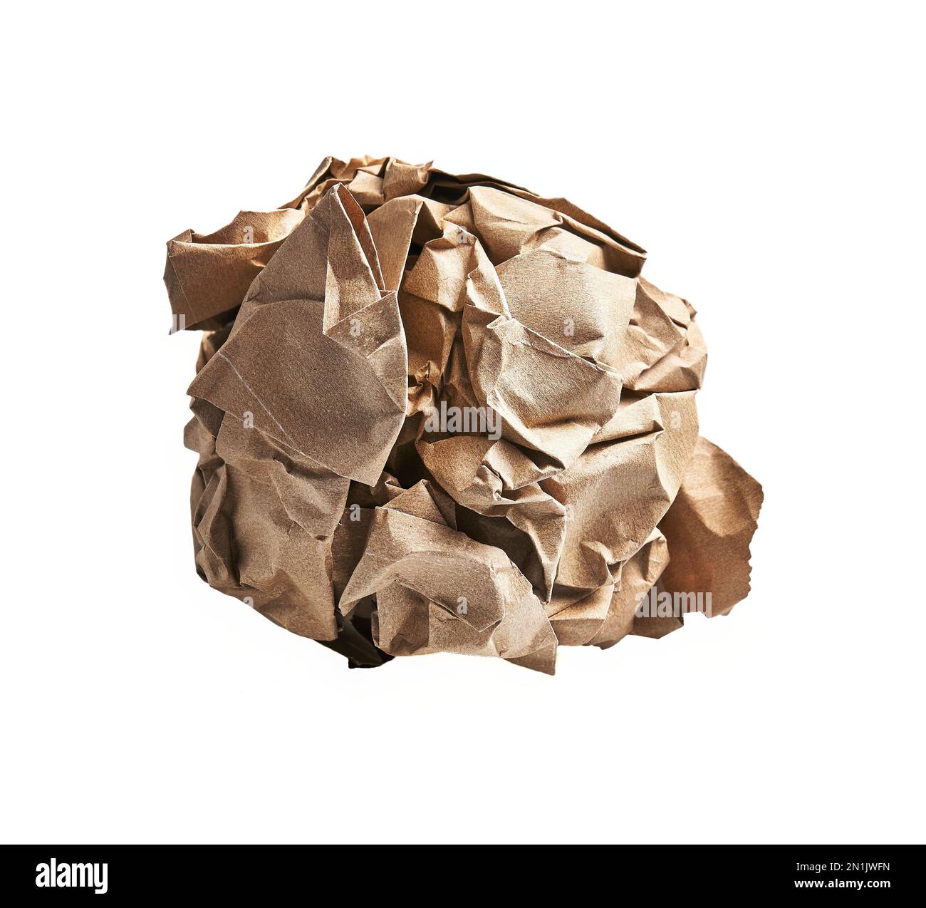 One brown crumpled paper ball over isolated white background Stock ...