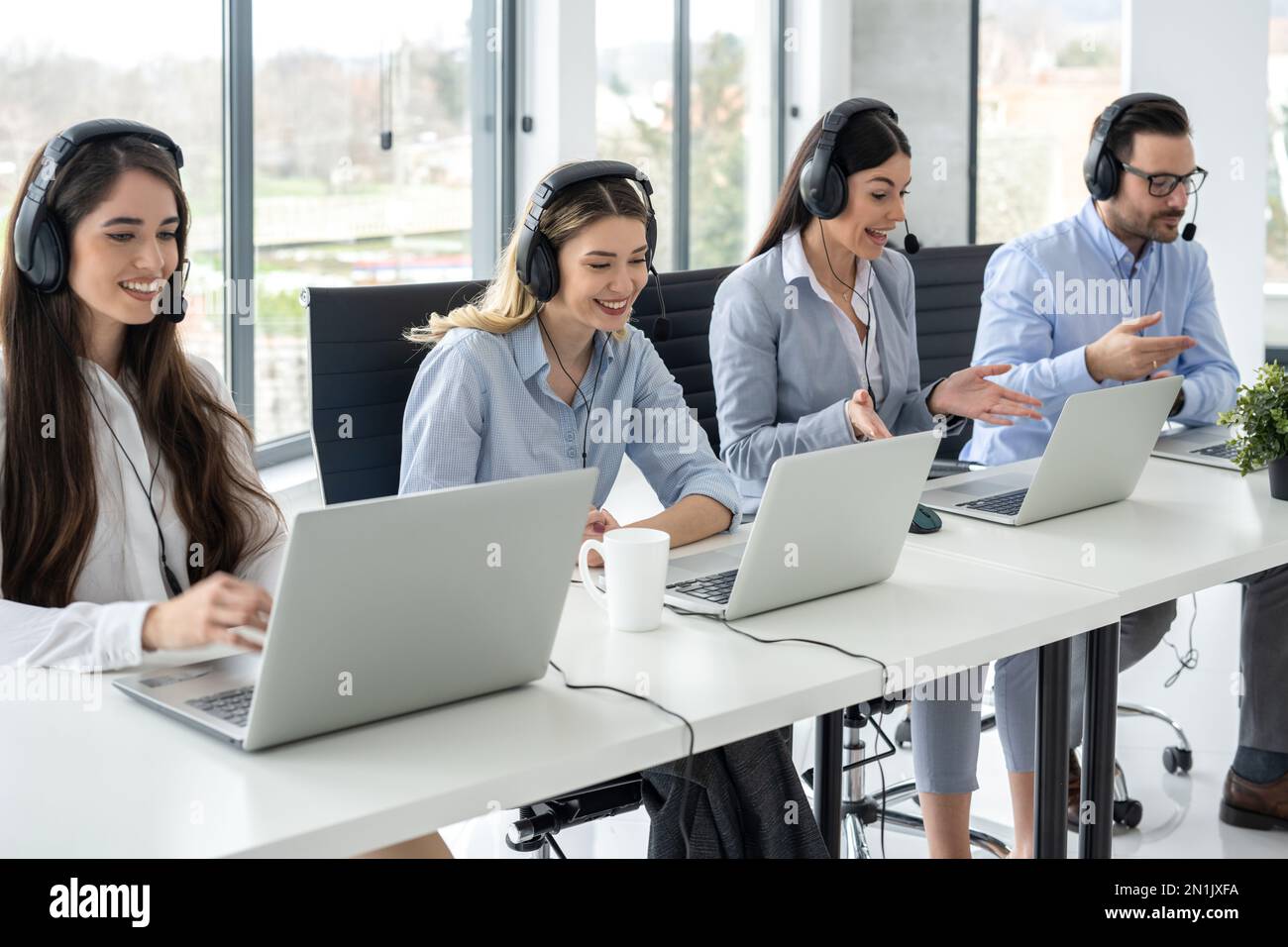 Executive female operator working headset hi-res stock photography and images - Alamy