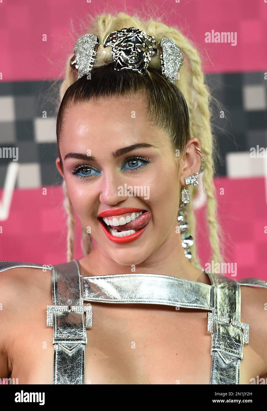 Miley Cyrus arrives at the MTV Video Music Awards at the Microsoft ...
