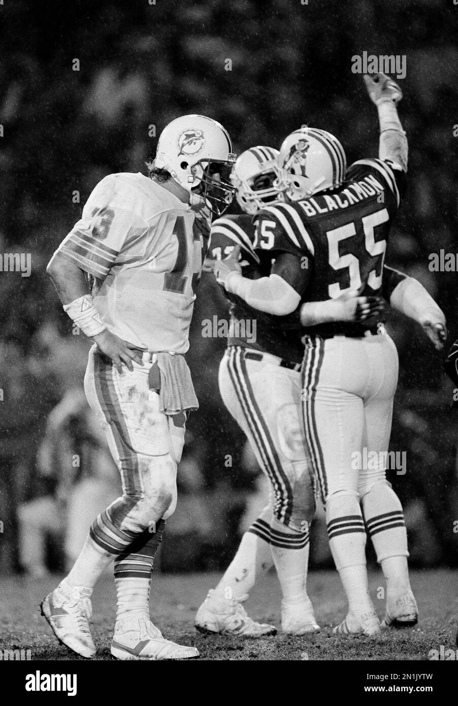 Miami Dolphins quarterback Dan Marino (13) heads back to the bench ...
