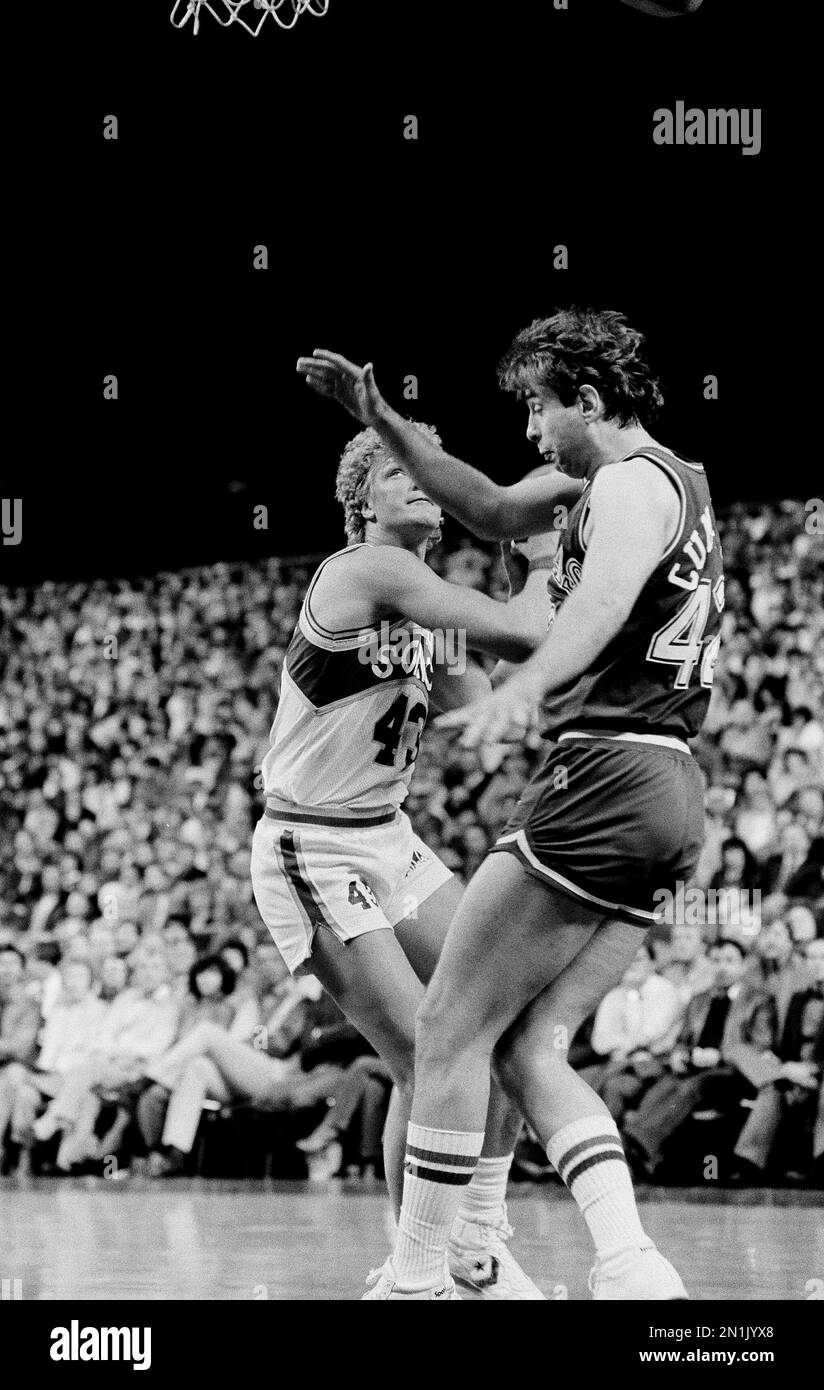 Sonic center Jack Sikma, left, elbows Dallas center Pat Cummings out of ...
