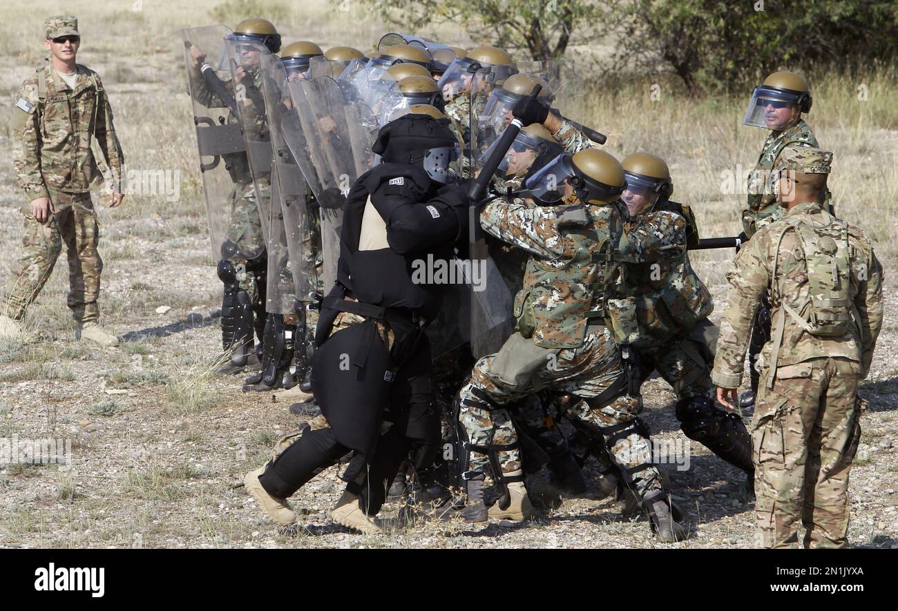 U.S. Army officers, first left and first right, of the 709 Military ...