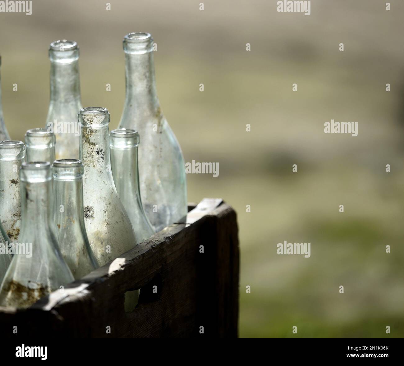 Local winery empty wine bottles in an antique wooden crate Stock Photo ...