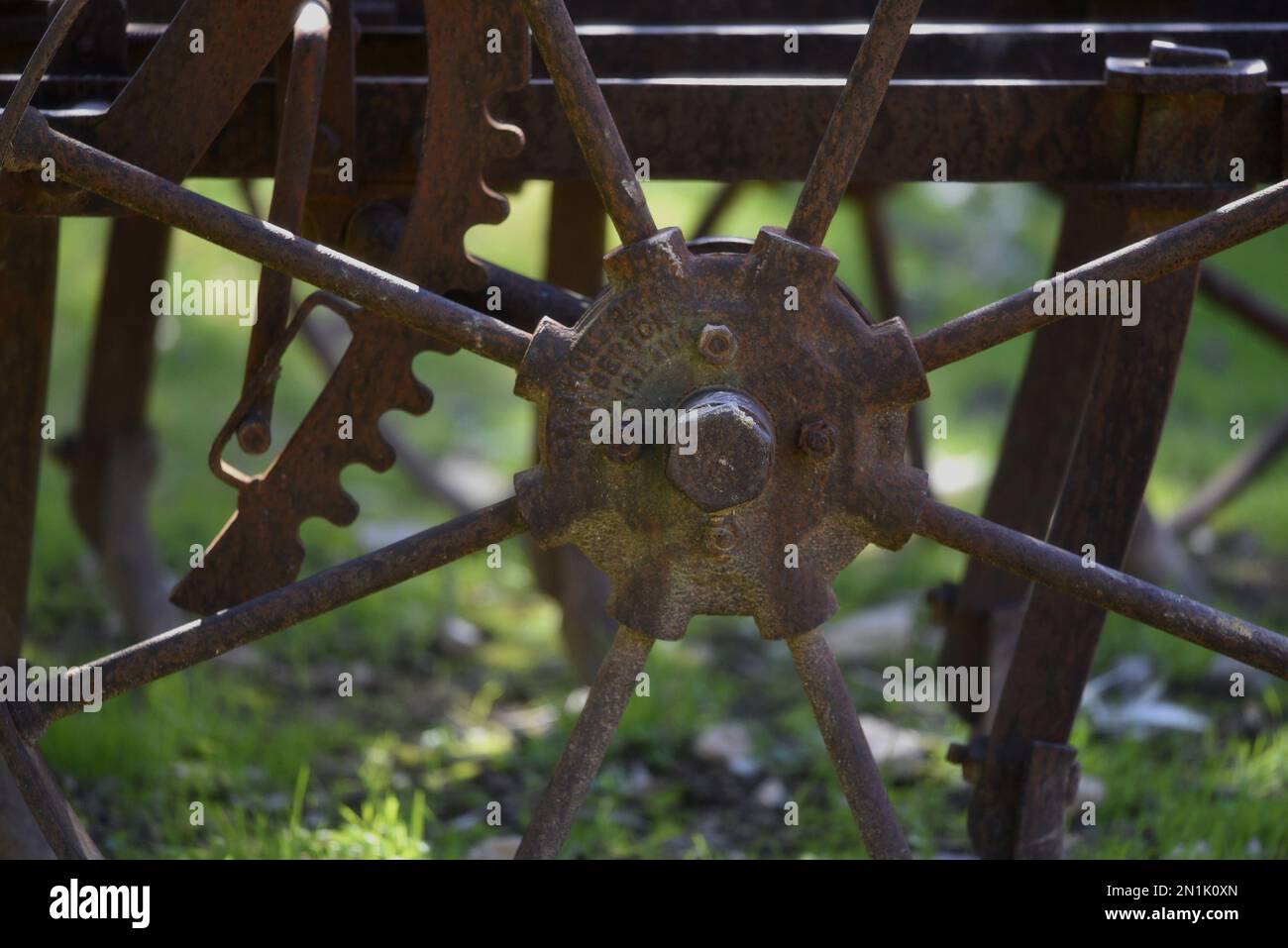 Vintage rusty wrought iron farm equipment Stock Photo - Alamy