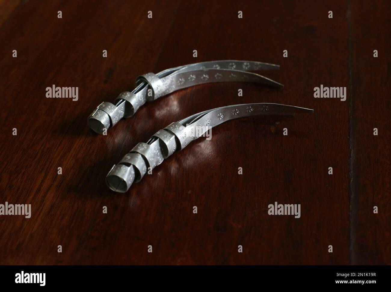 In this Aug. 2, 2015 photo, the "Janggay" or metal claws used as part ...