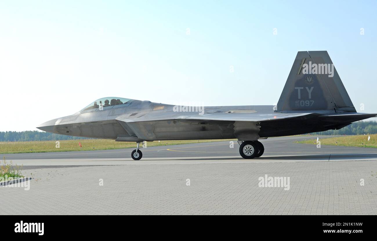 U.S. high-tech F-22 Raptor fighter jet is taxiing after landing at a ...