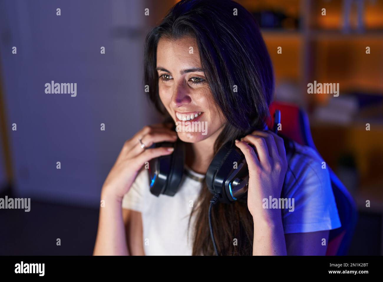 Young beautiful hispanic woman streamer smiling confident sitting on ...