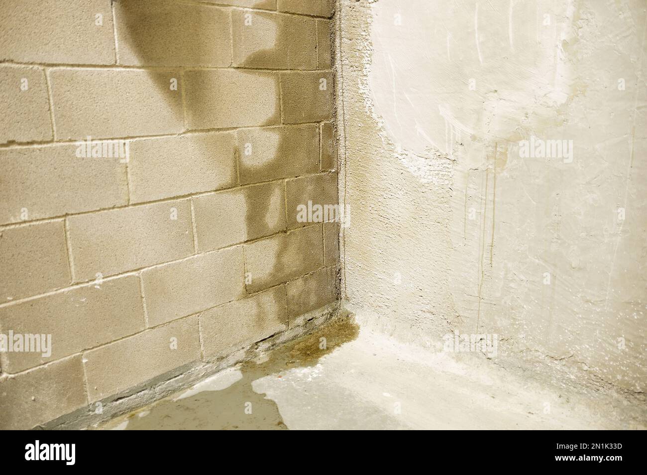 Rain water leaks on the wall causing damage Stock Photo - Alamy