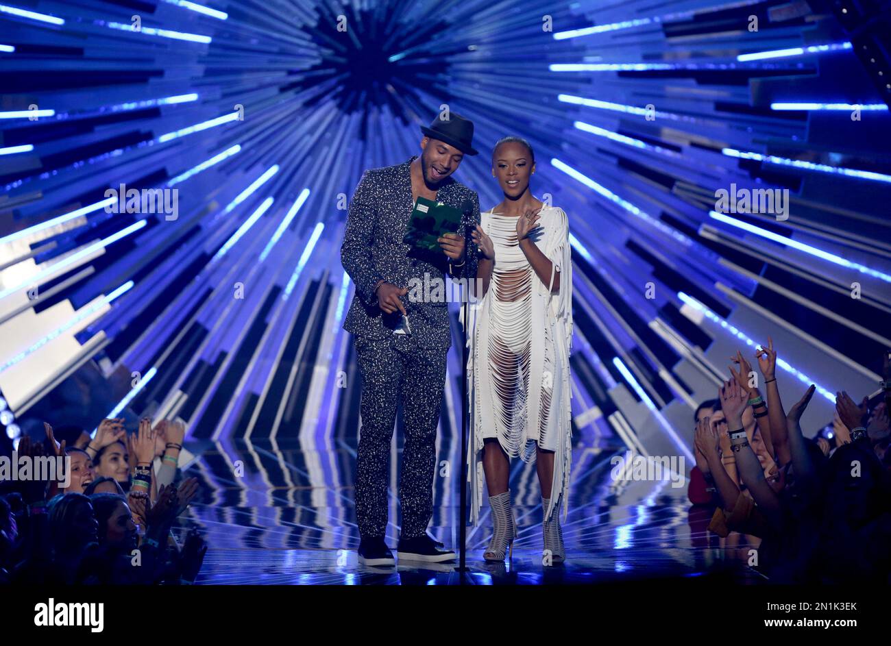 Jussie Smollett, left, and Serayah present the award for video with a ...