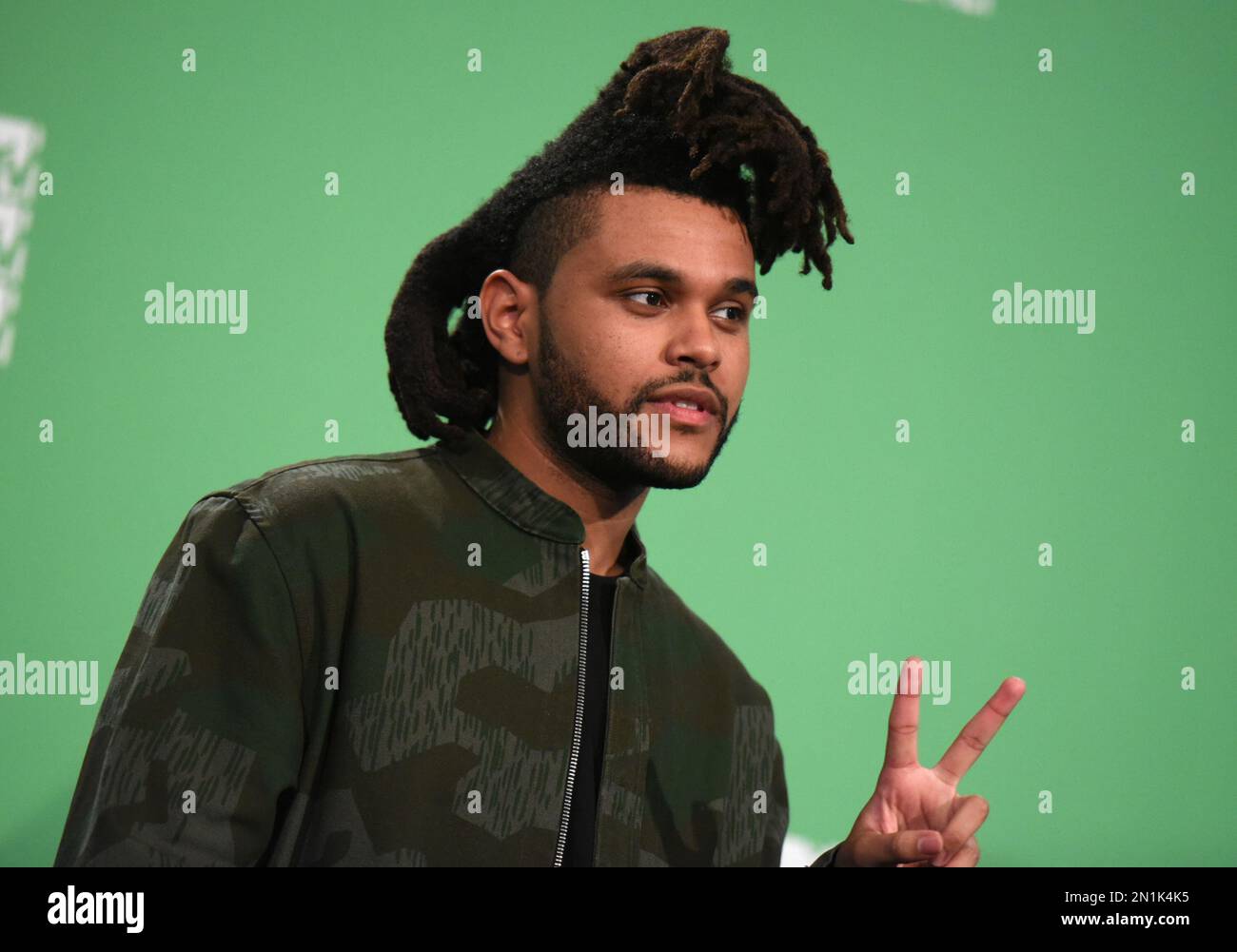 The Weeknd poses in the press room at the MTV Video Music Awards at the ...