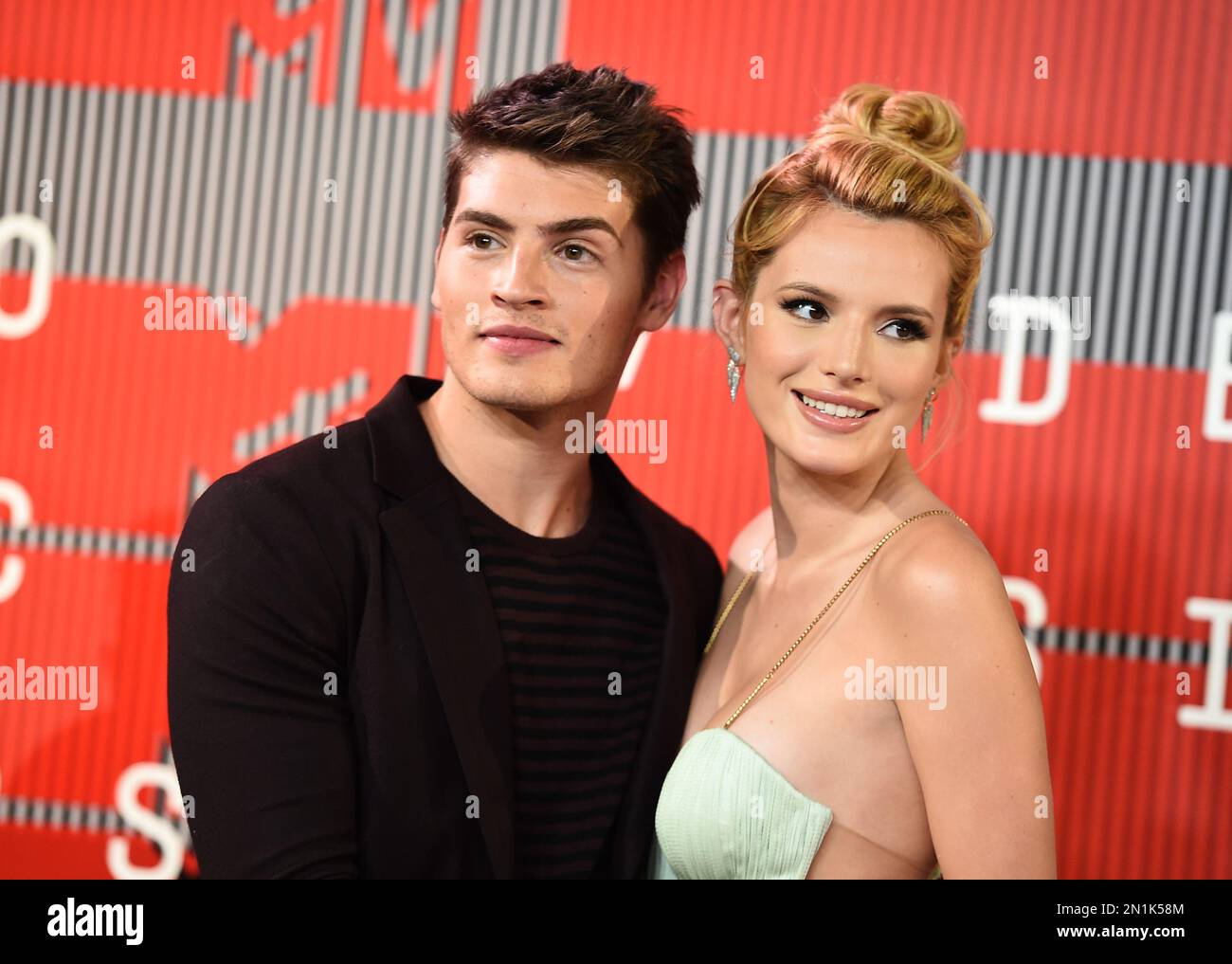 Gregg Sulkin, left, and Bella Thorne arrive at the MTV Video Music ...