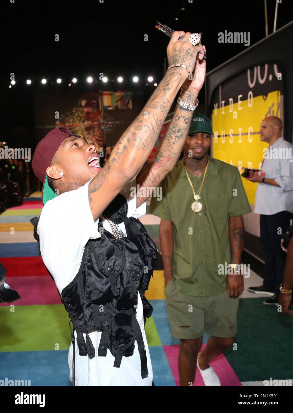Tyga takes a selfie as he arrives at the MTV Video Music Awards at the ...