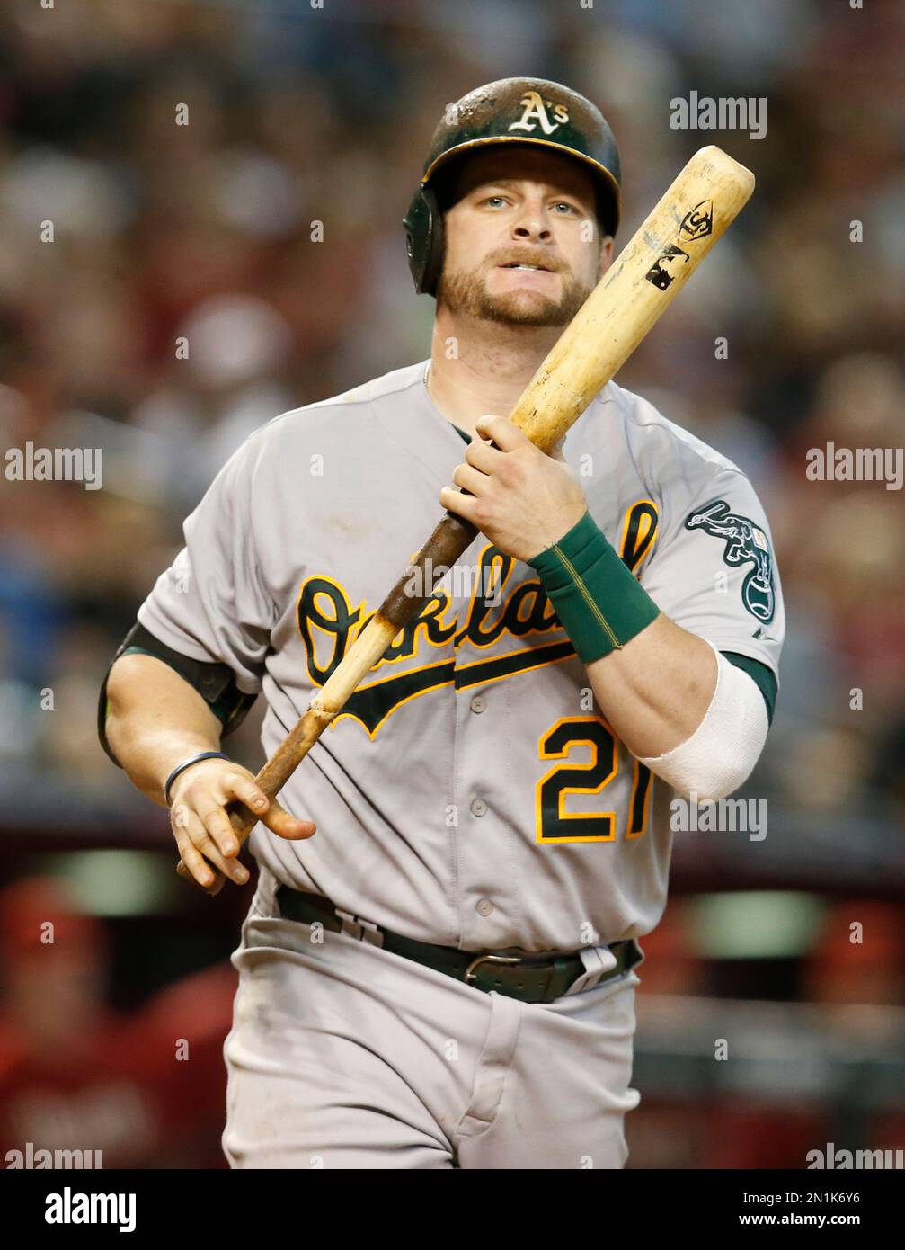 Oakland Athletics catcher Stephen Vogt (21) hits against the Arizona ...