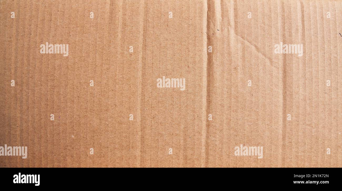 Brown cardboard carton material texture background Stock Photo - Alamy
