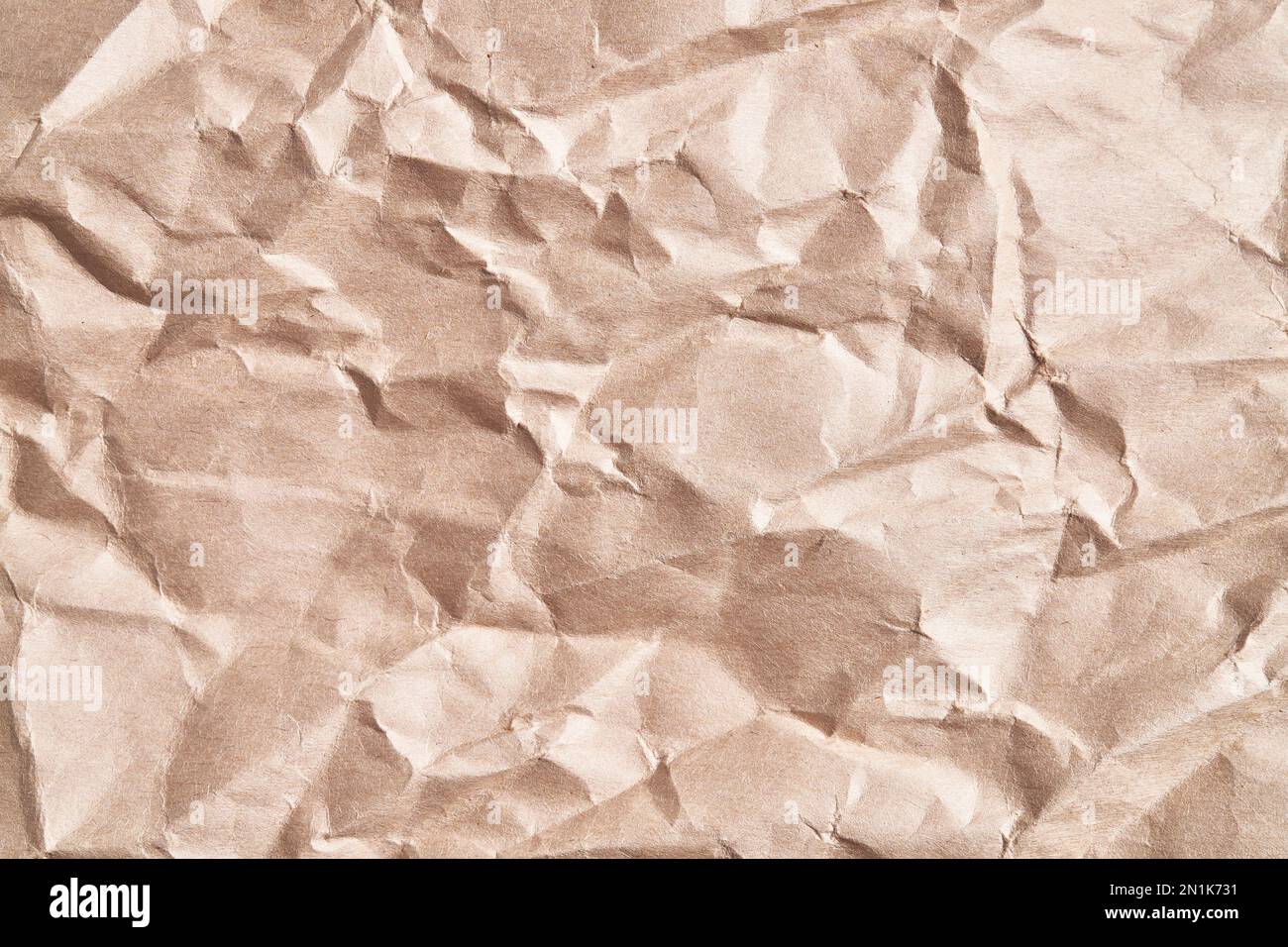 Brown crumpled paper texture background Stock Photo - Alamy